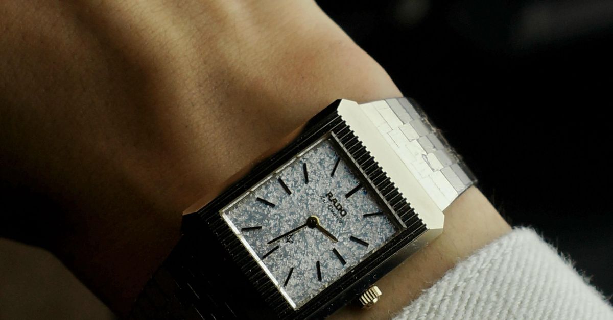 This Rado model features a dial with a subtle iridescent effect, where ...