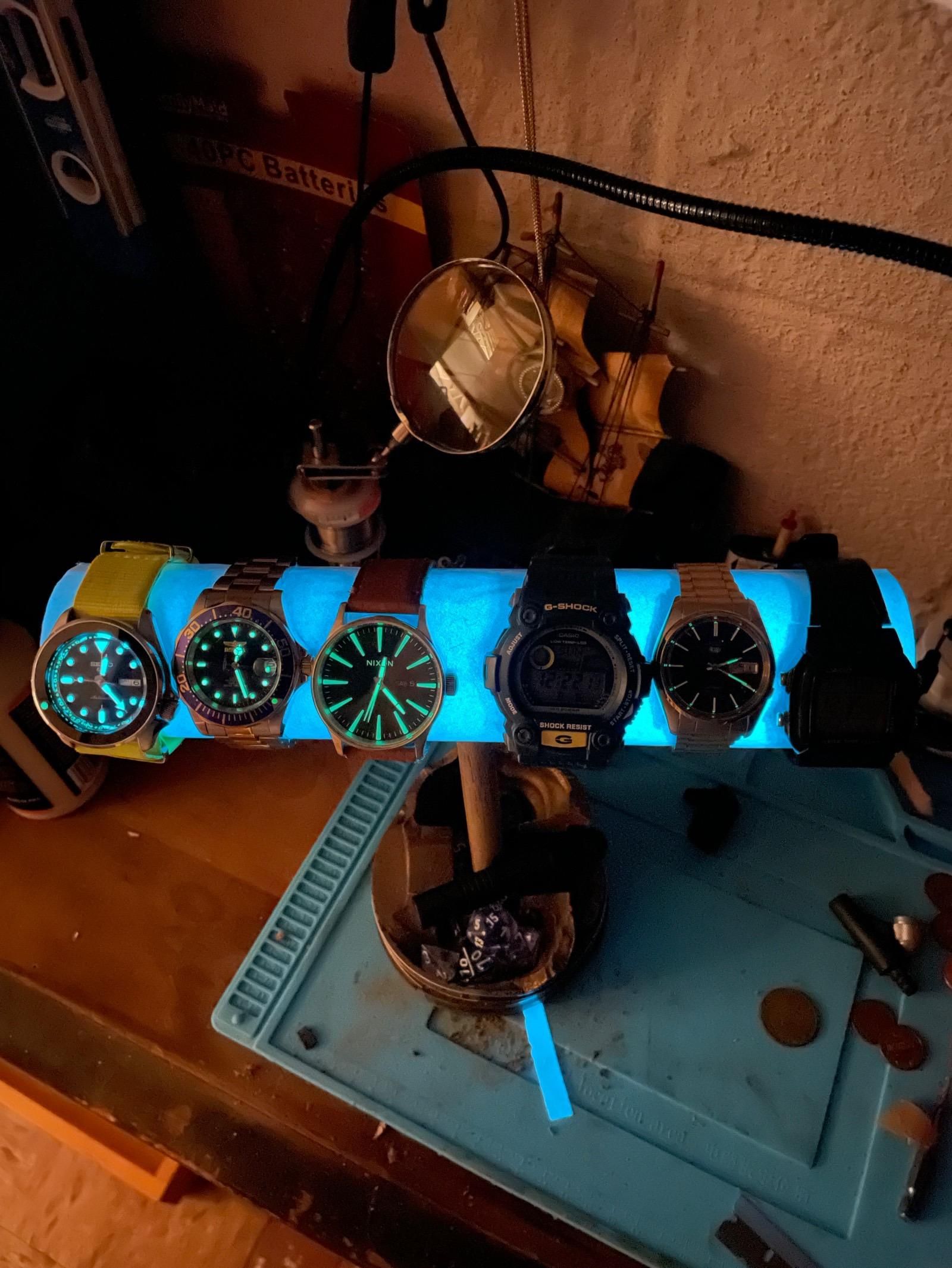 I made my own watch stand from a cardboard tube, a drum stick and ...