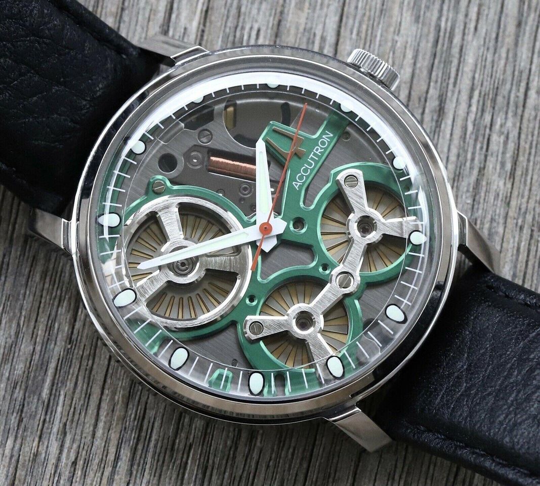 Three different watches with sweeping second hands | WatchCrunch