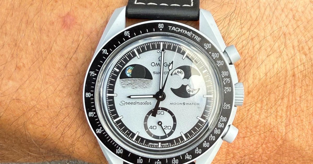 Omega earth phase swatch | WatchCrunch