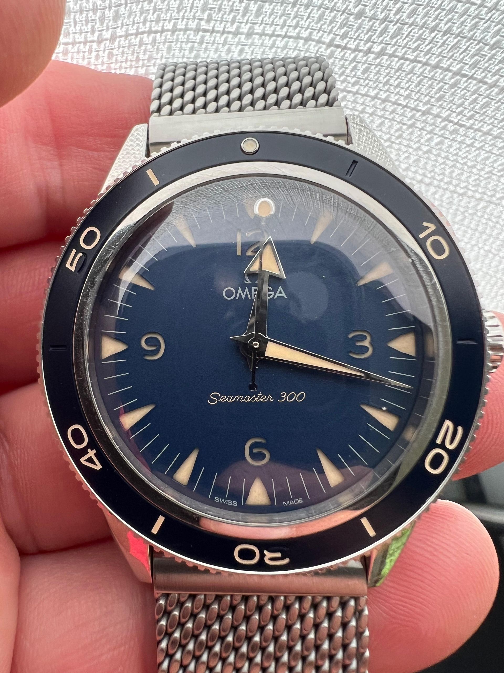 Lume fell out of the bezel on my Seamaster 300. High end fake or QC ...