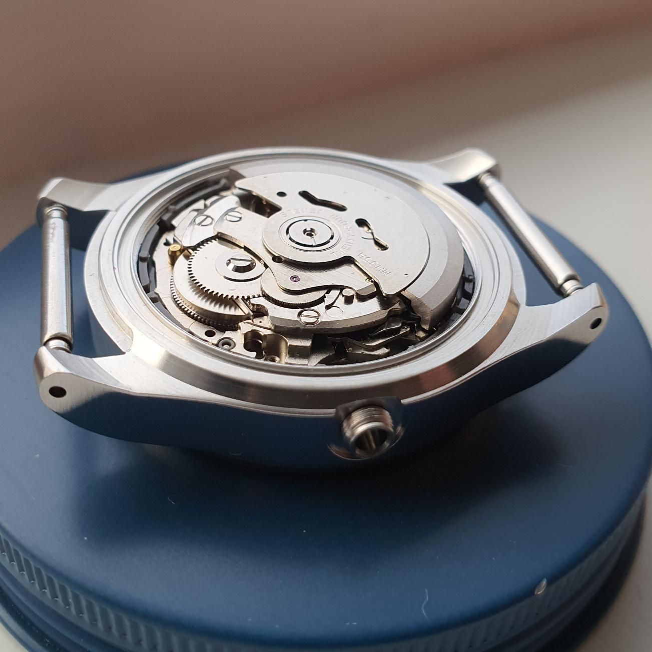 Fitting a NH35 movement to a Namoki field case | WatchCrunch