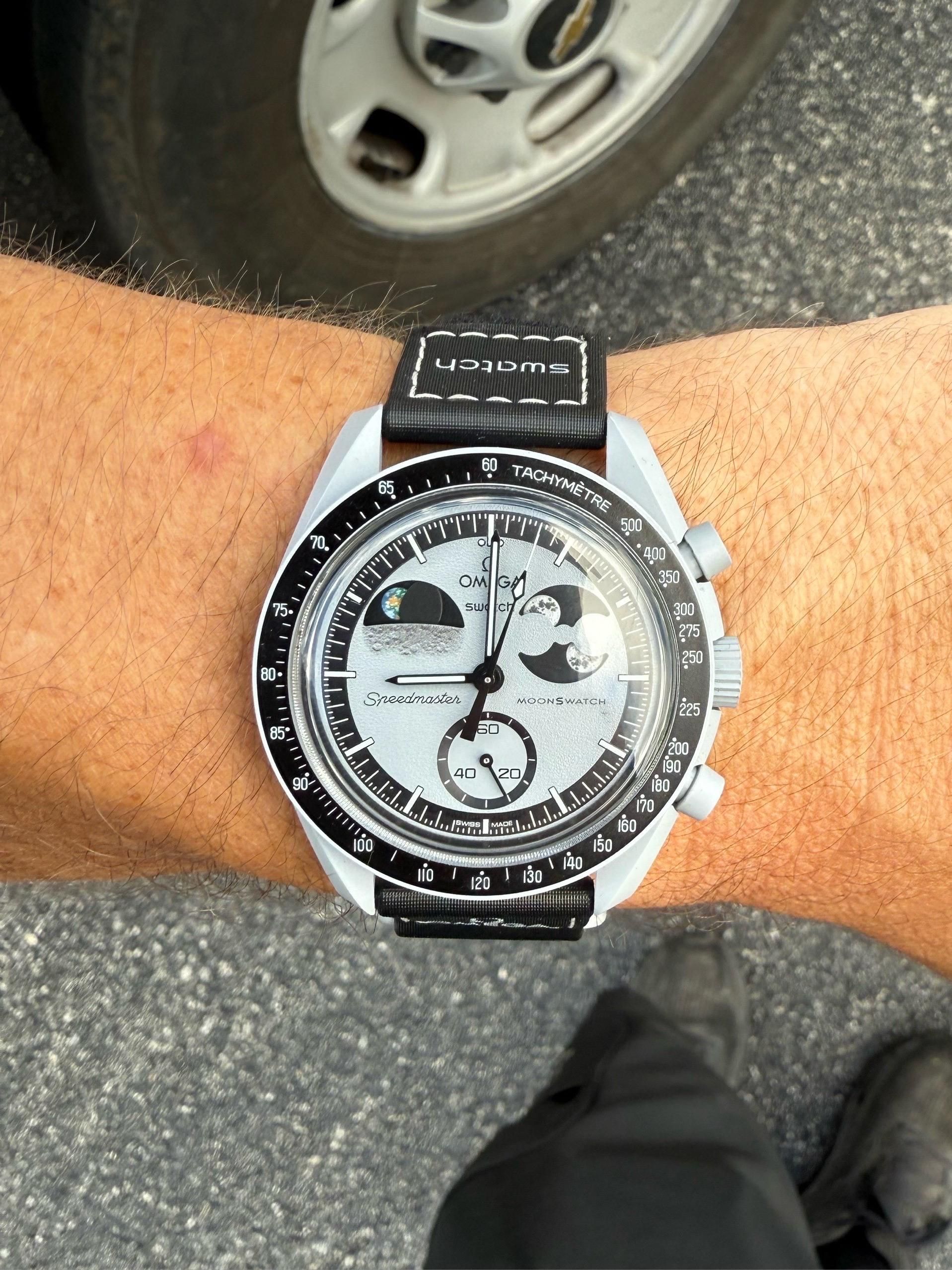 Omega earth phase swatch | WatchCrunch