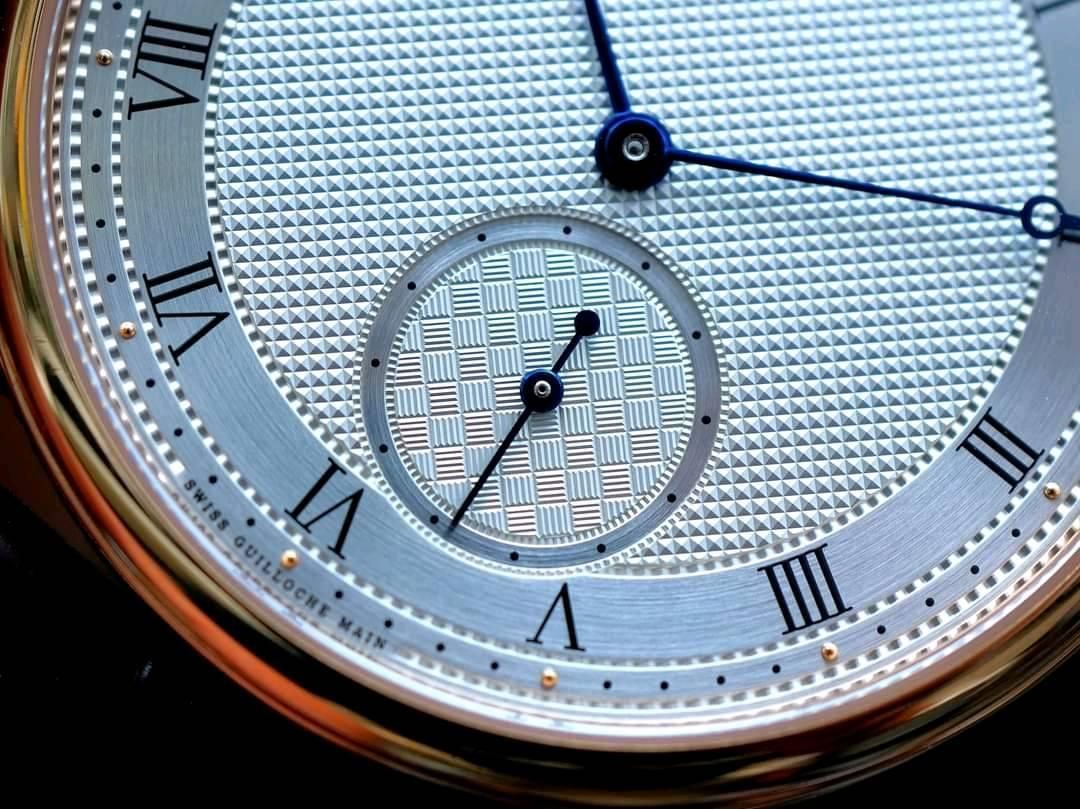 Off-center small second | WatchCrunch