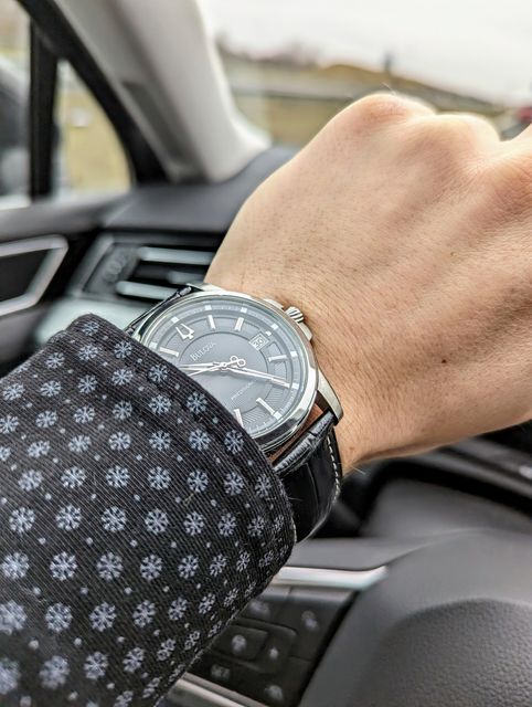 Three different watches with sweeping second hands | WatchCrunch