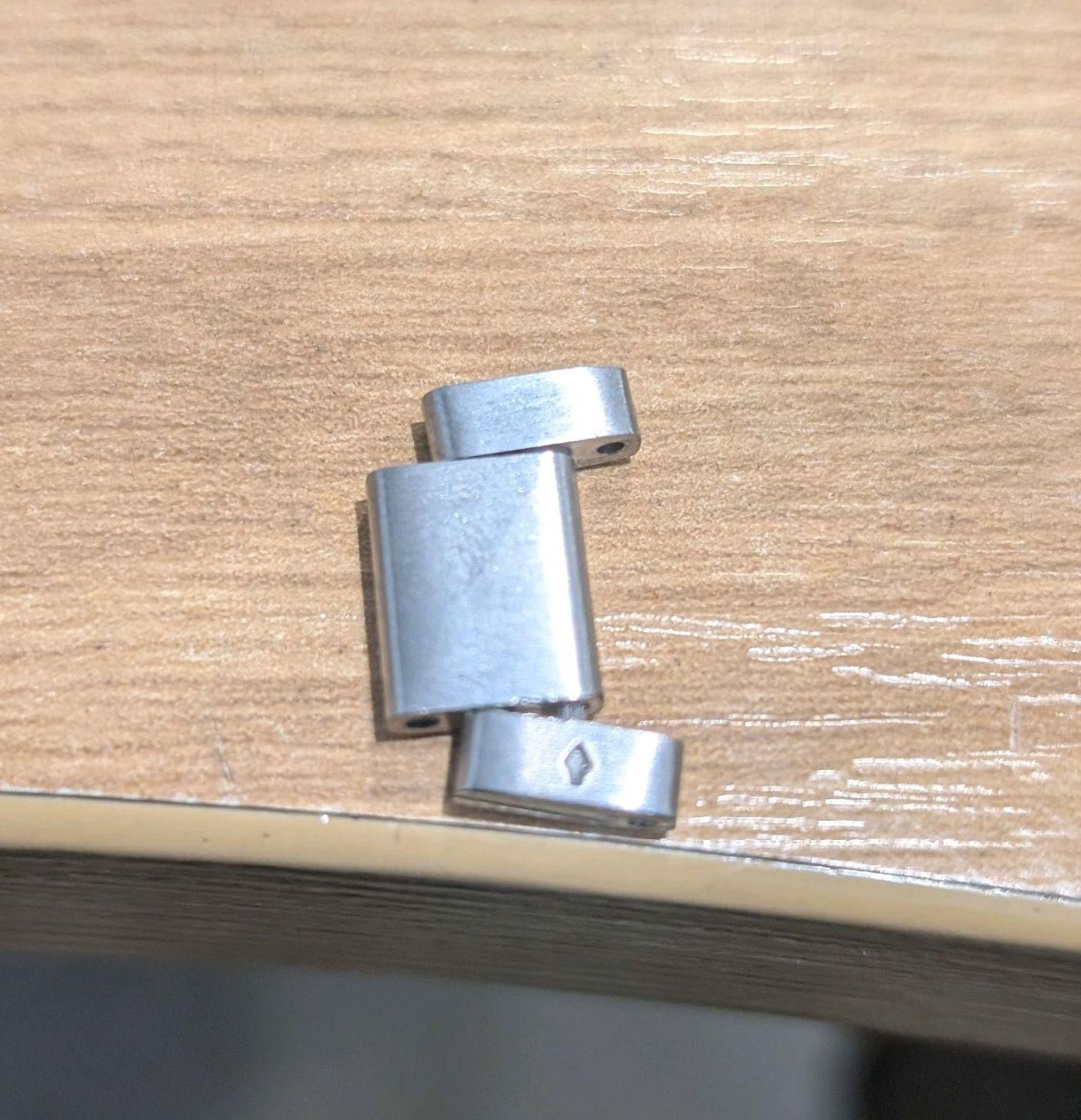 Don't have a half link but have some basic hand tools, an angle grinder ...
