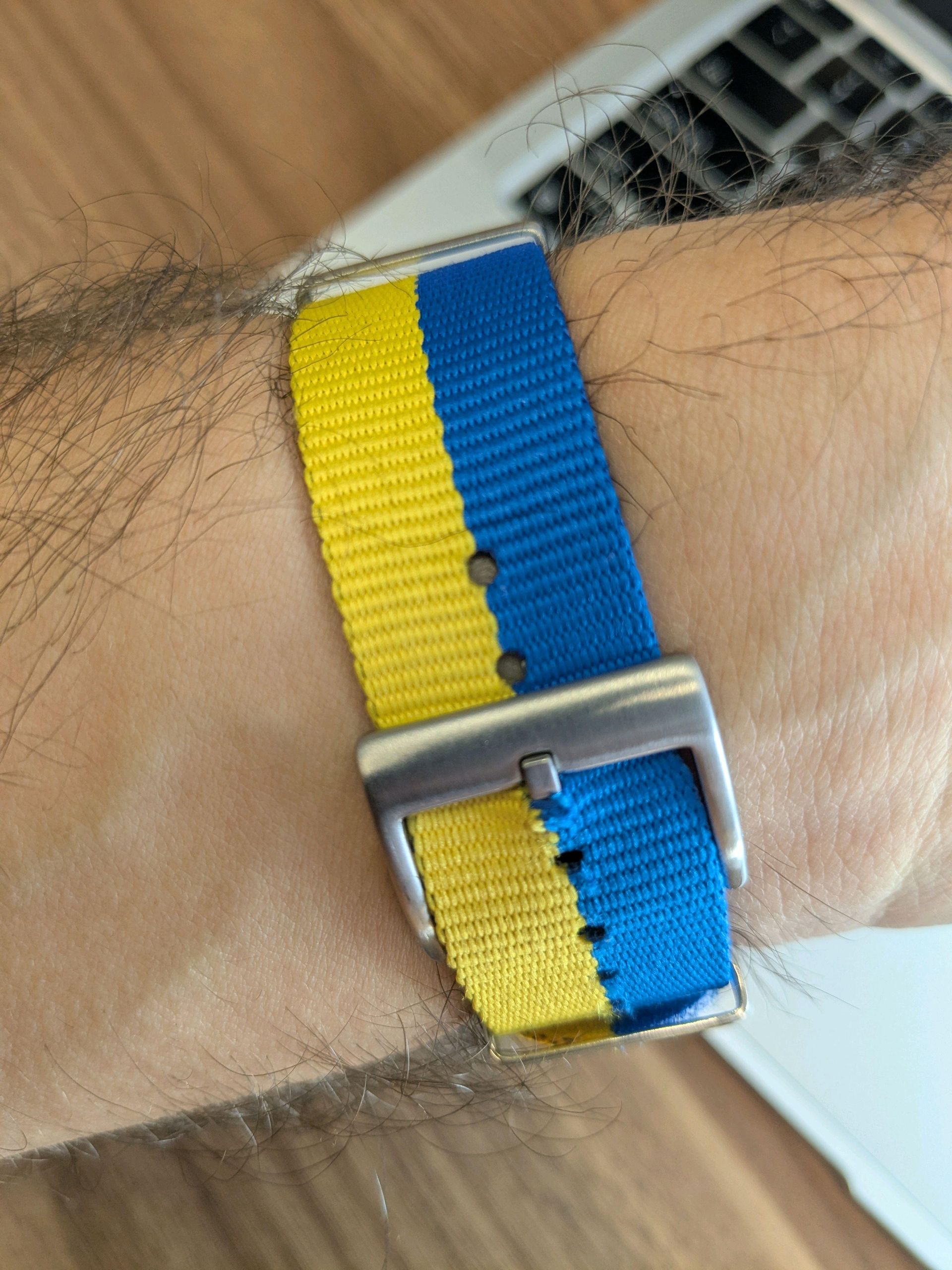 Is it normal for the NATO strap pin hole to stretch this much ...